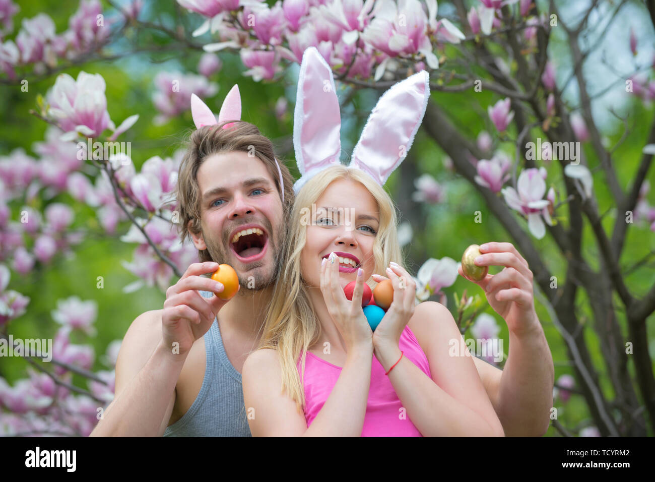 Spring, nature, environment. happy easter of man and woman with eggs ...