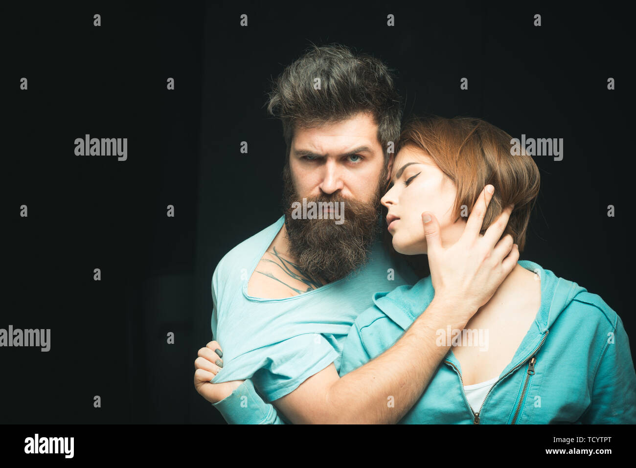 Fashion shot of couple after haircut. Hairstyle concept. Man with ...