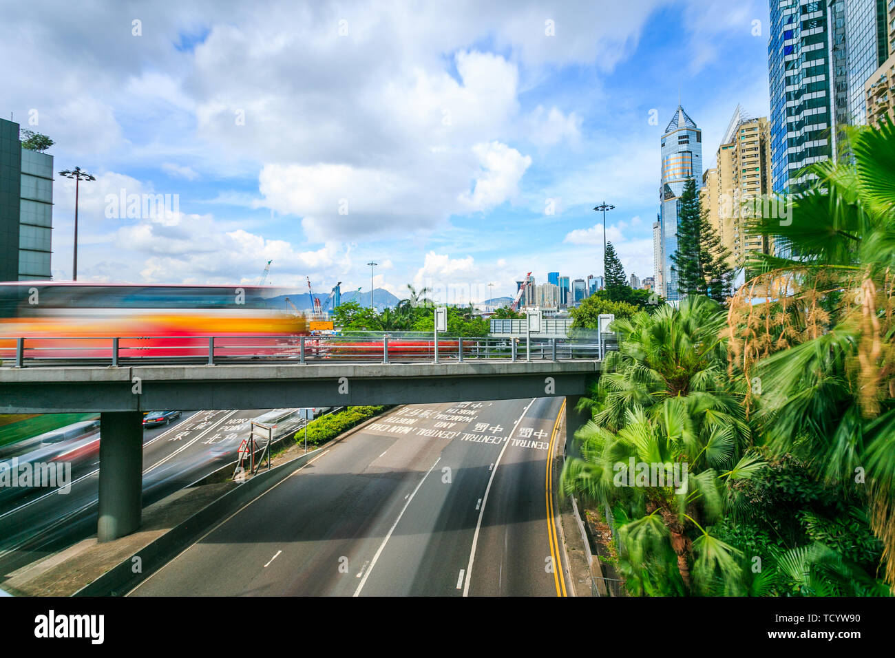 Busy traffic and skyline in modern city Stock Photo - Alamy