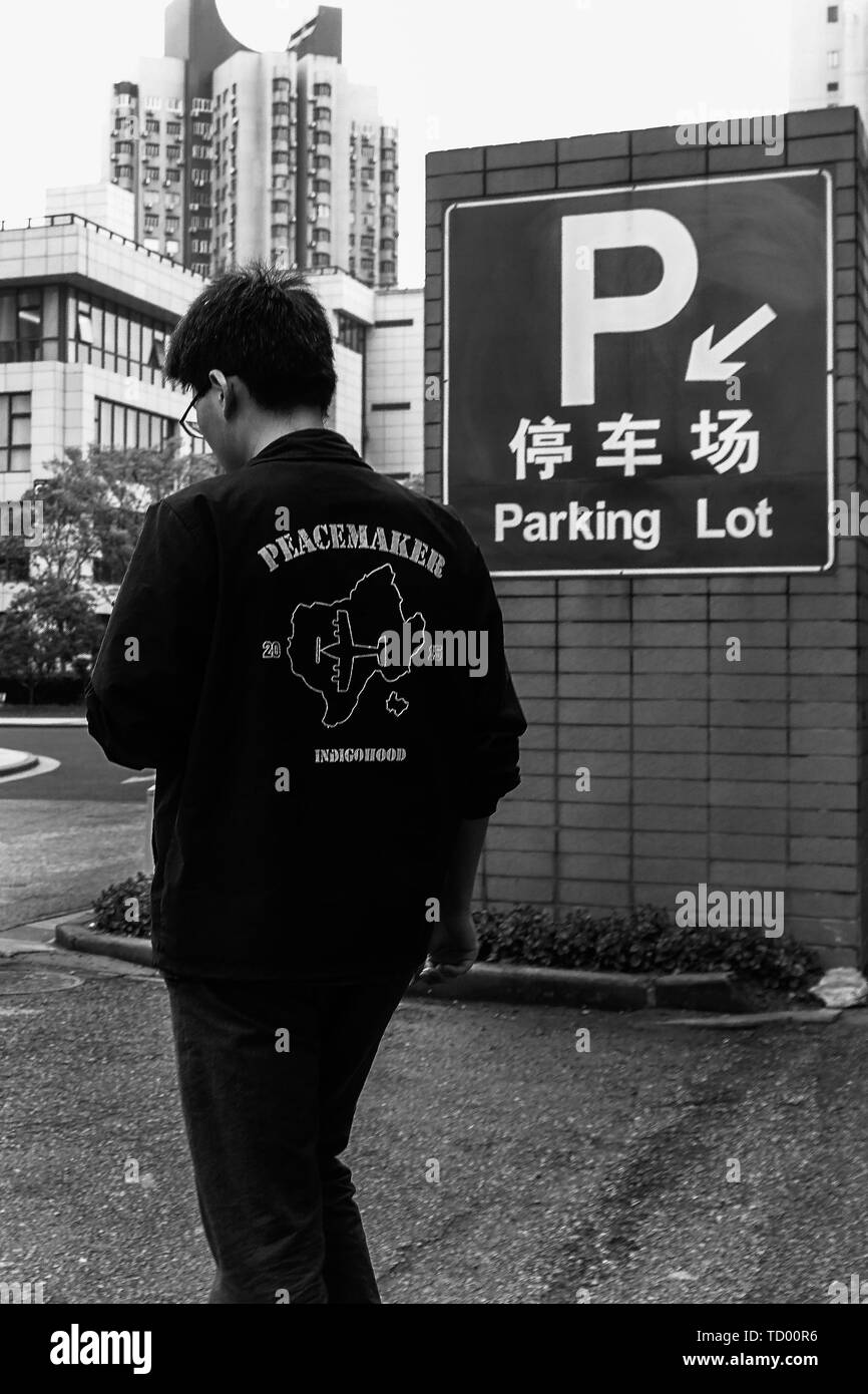 Patterns of men's clothes and arrows in the parking lot Stock Photo - Alamy