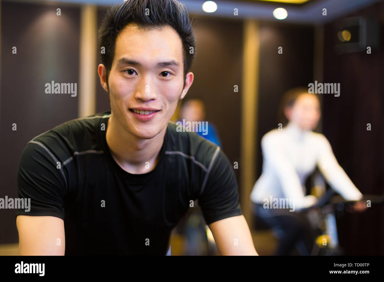 young asian people working out in modern gym Stock Photo - Alamy
