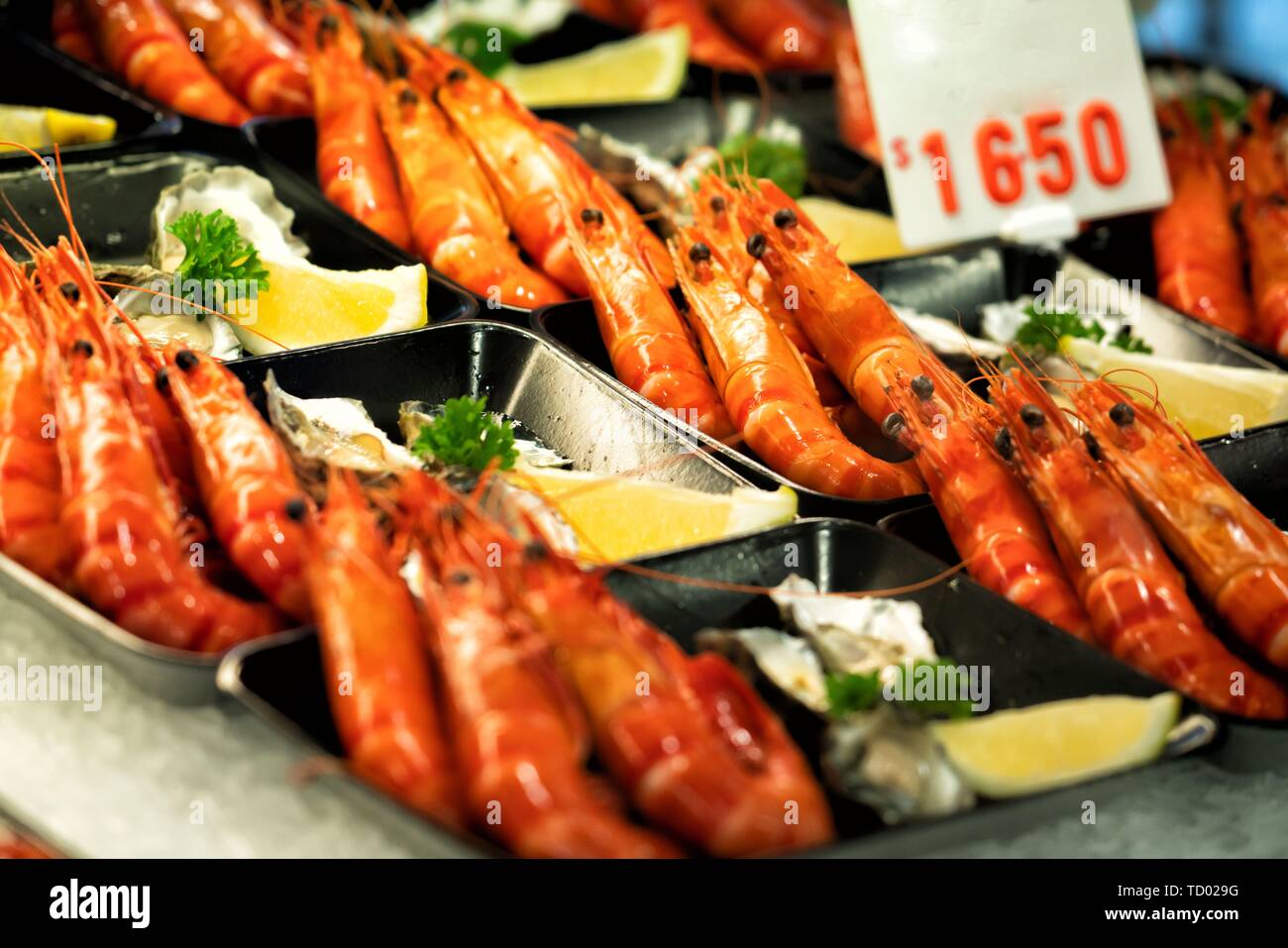 close up on seafood platter with price tag Stock Photo - Alamy