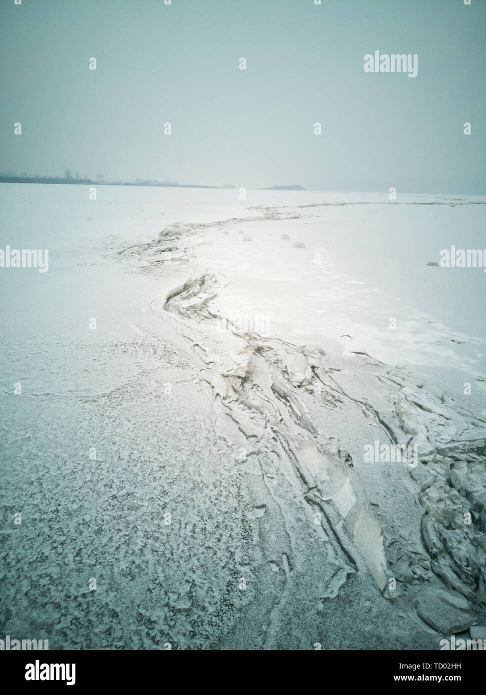 Lake after snow Stock Photo - Alamy