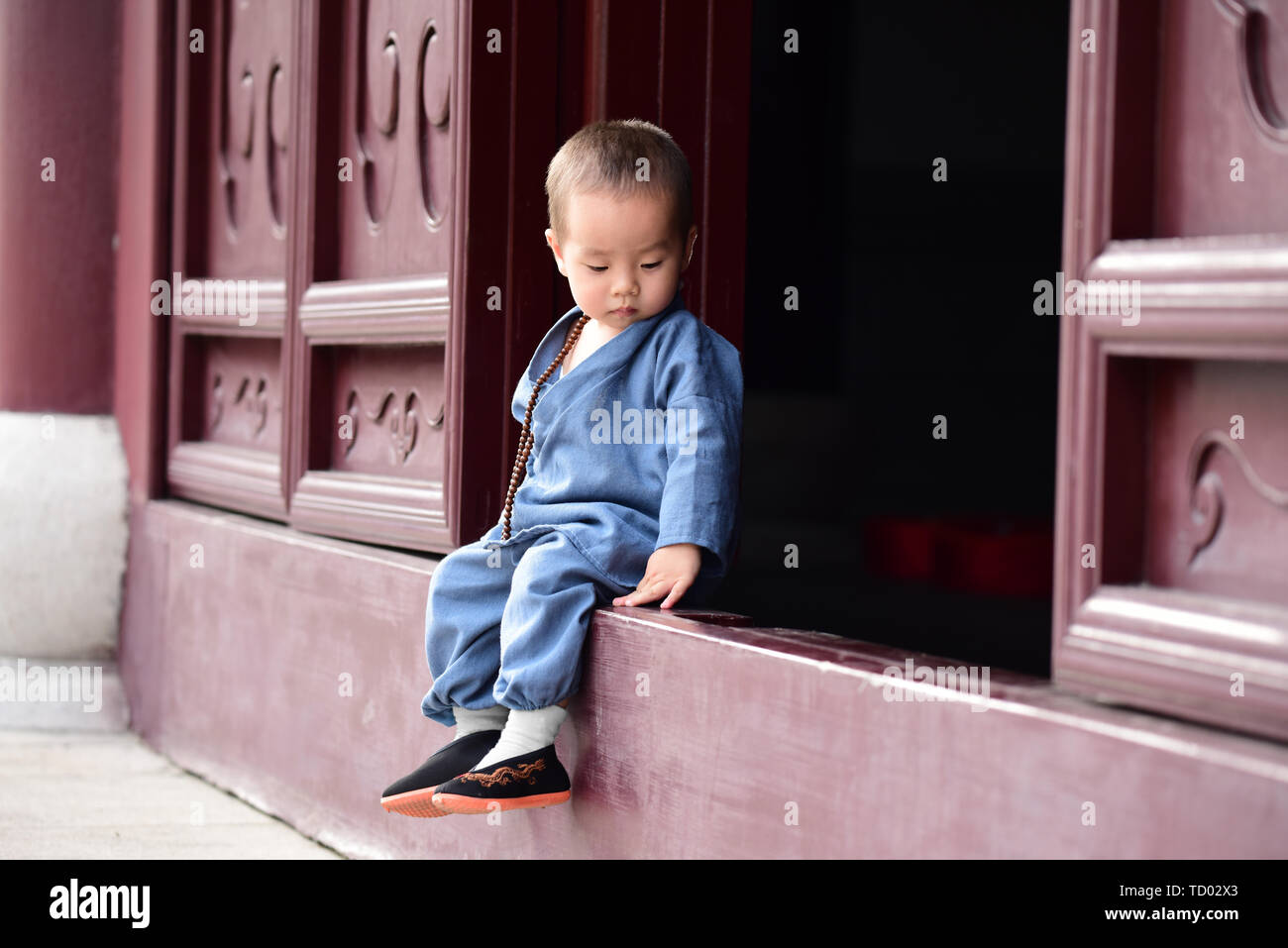 Cute little monk Stock Photo - Alamy