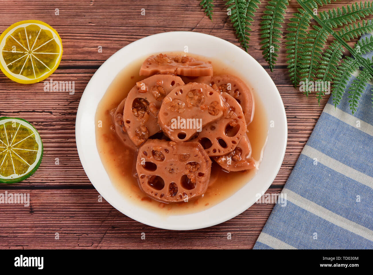 Gourmet honey lotus root slices Stock Photo - Alamy