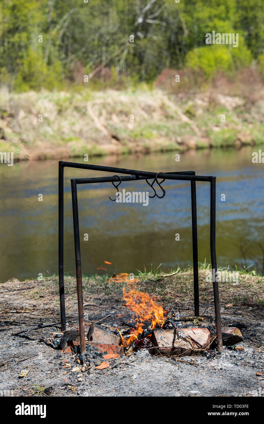 open fire burning in countryside home garden. controlled pyromaniac ...