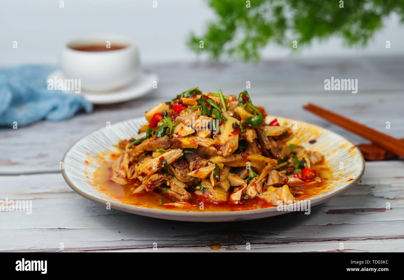 drooling chicken, stick chicken Stock Photo - Alamy