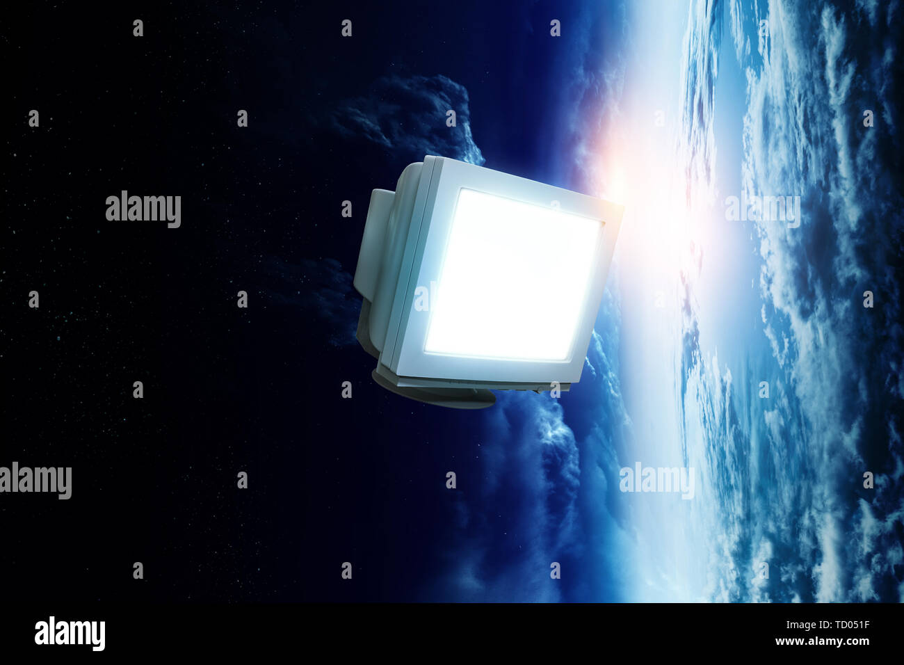 Retro pc screen flying in space Stock Photo - Alamy