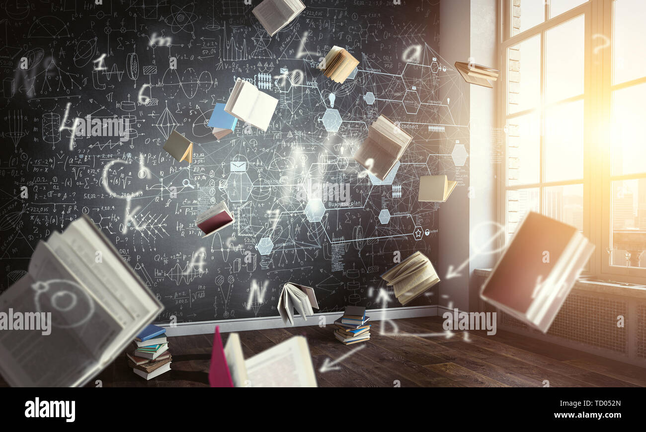 Class workplace with flying objects Stock Photo - Alamy