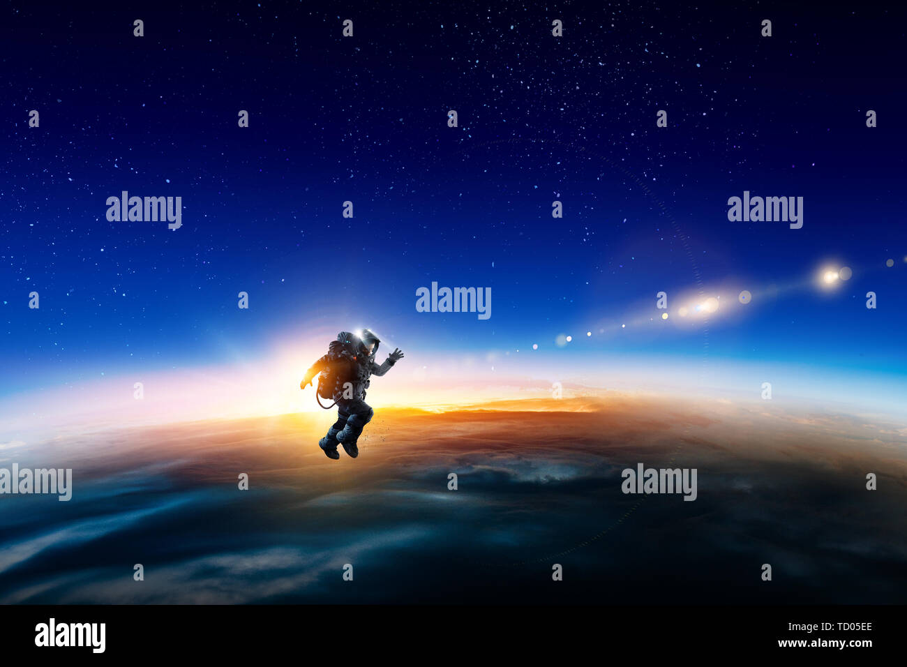 Astronaut in space on planet orbit Stock Photo - Alamy