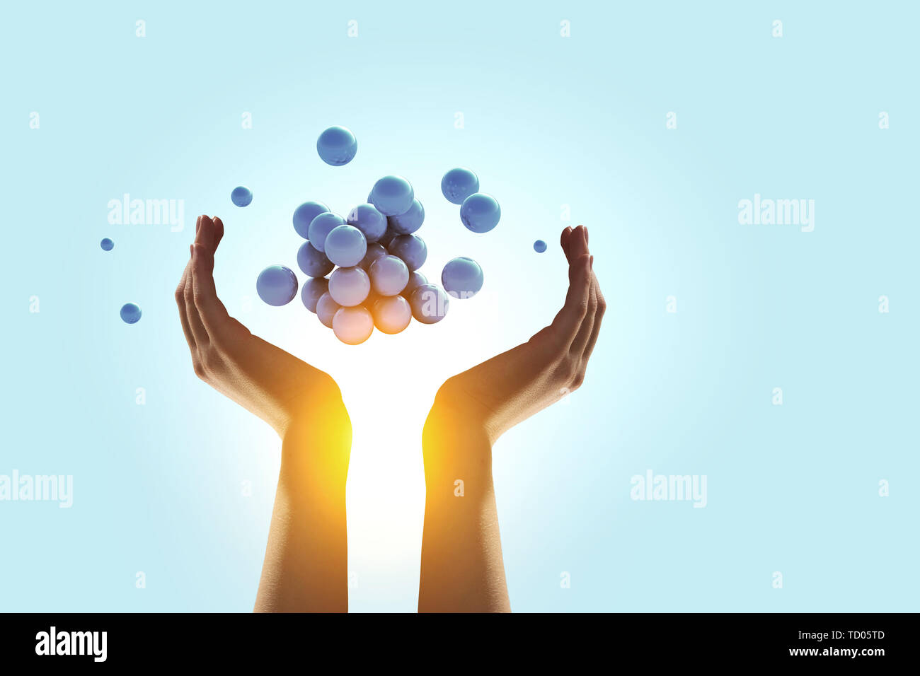 Woman hands and a bunch of spheres levitating above. Mixed media Stock ...