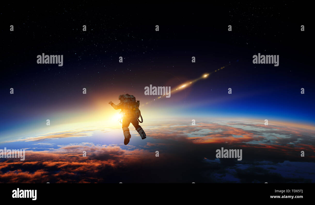 Astronaut in space on planet orbit hi-res stock photography and images ...