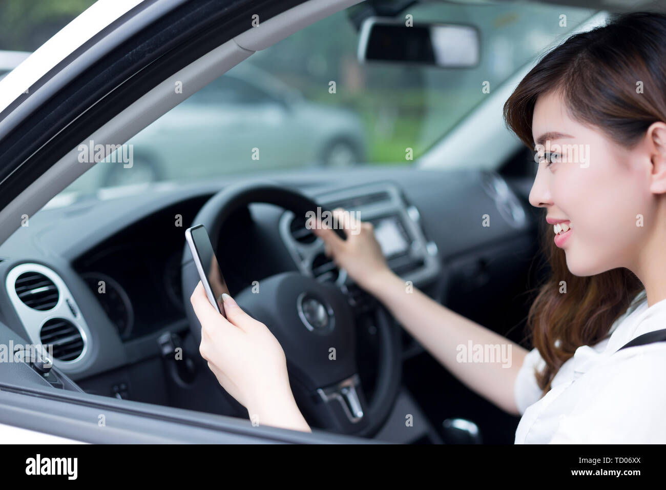 Asian beautiful woman driving car portrait Stock Photo - Alamy