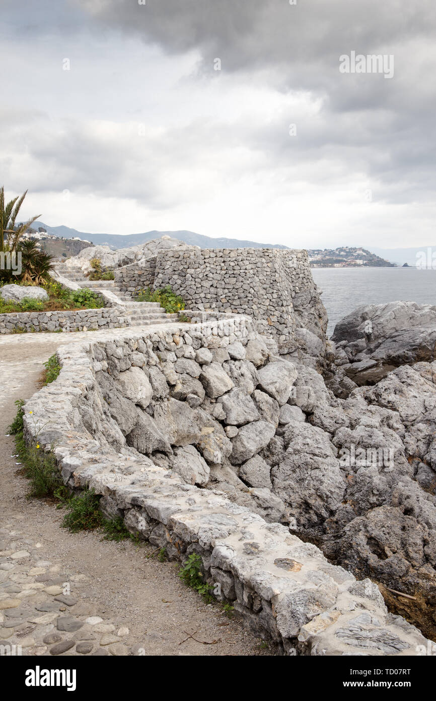 stone pathway going along the coastline of spain Stock Photo - Alamy