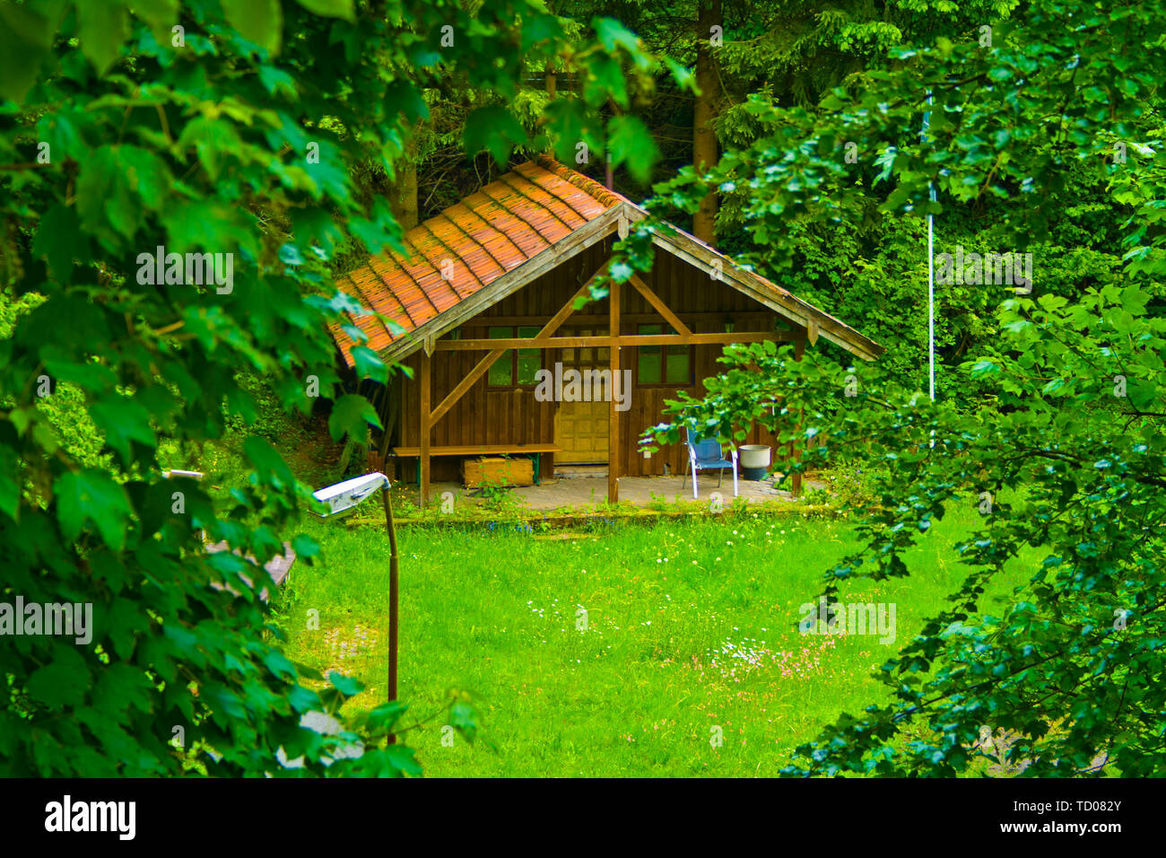 Small idyllic wooden hut in the woods of Bavaria, Germany Stock Photo ...