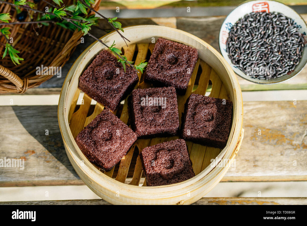 Fragrant black rice cake Stock Photo - Alamy