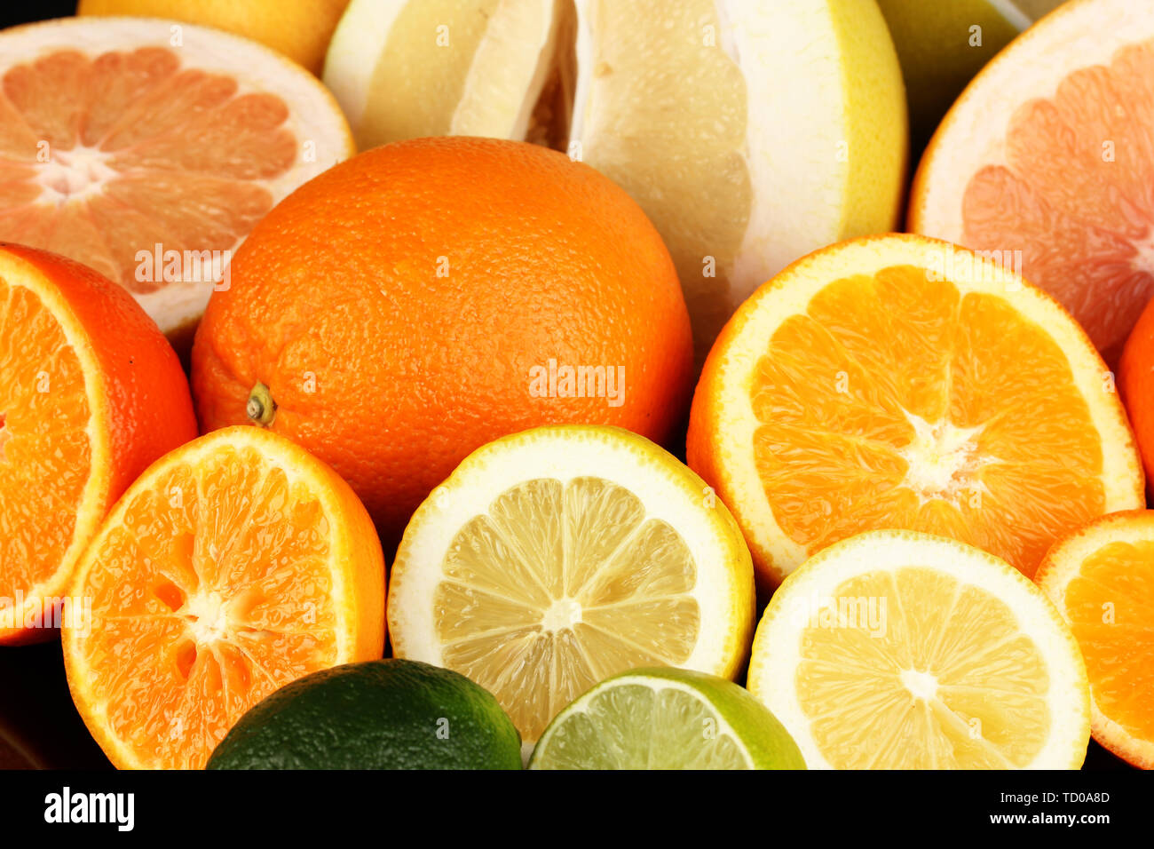Lots ripe citrus close-up background Stock Photo - Alamy
