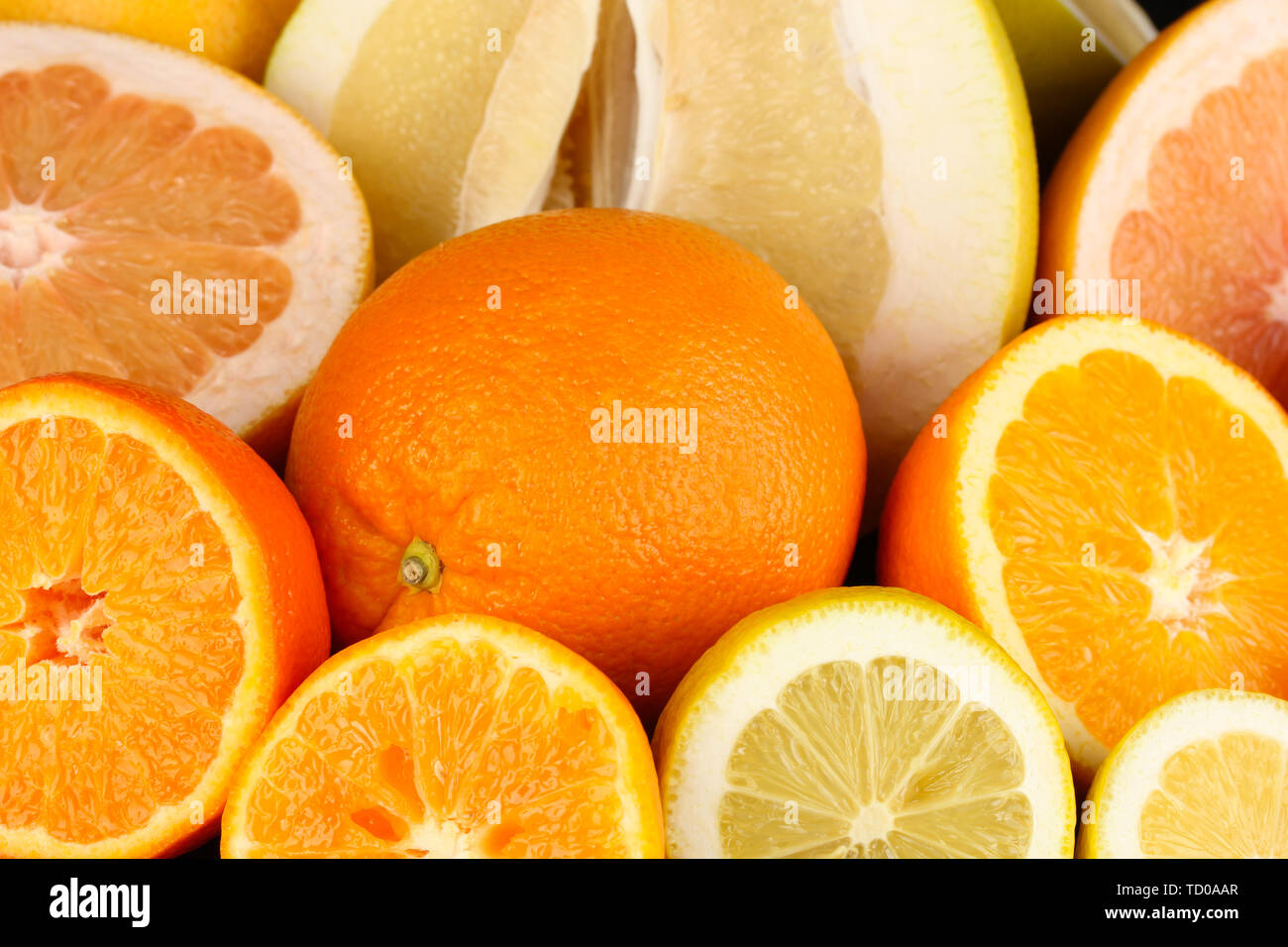 Lots ripe citrus close-up background Stock Photo - Alamy