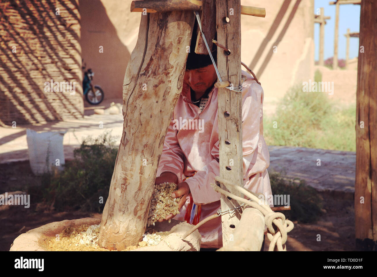 Oil extraction, ancient oil extraction technology Stock Photo - Alamy