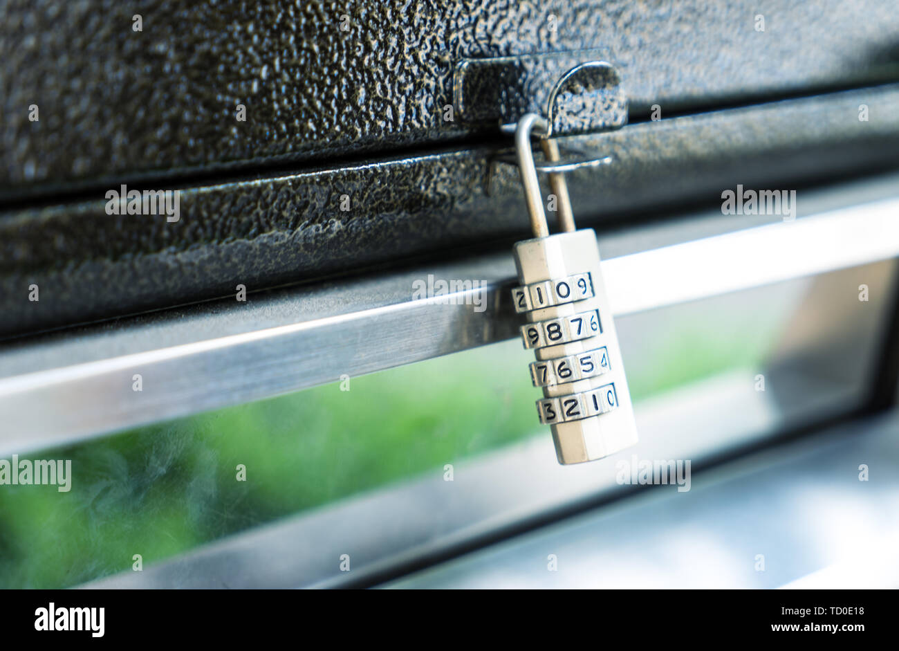 combination locker on black leather luggage Stock Photo - Alamy