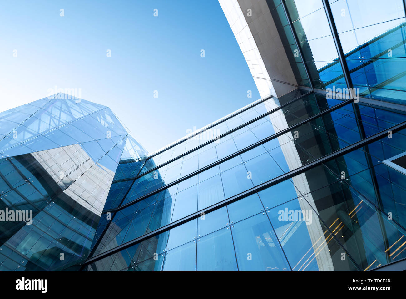 Low angle view modern building exterior Stock Photo - Alamy