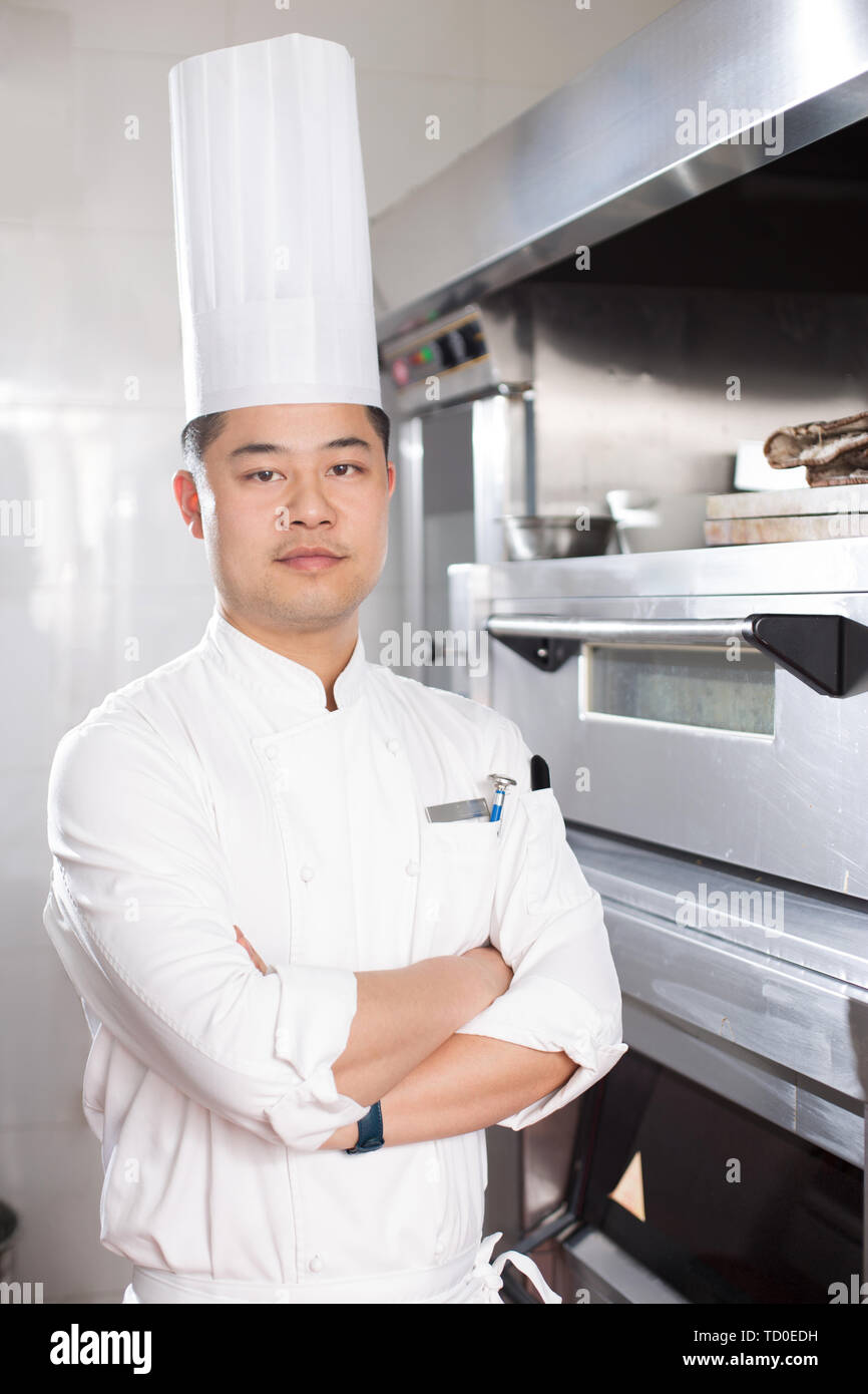 Chinese young man kitchen hi-res stock photography and images - Alamy