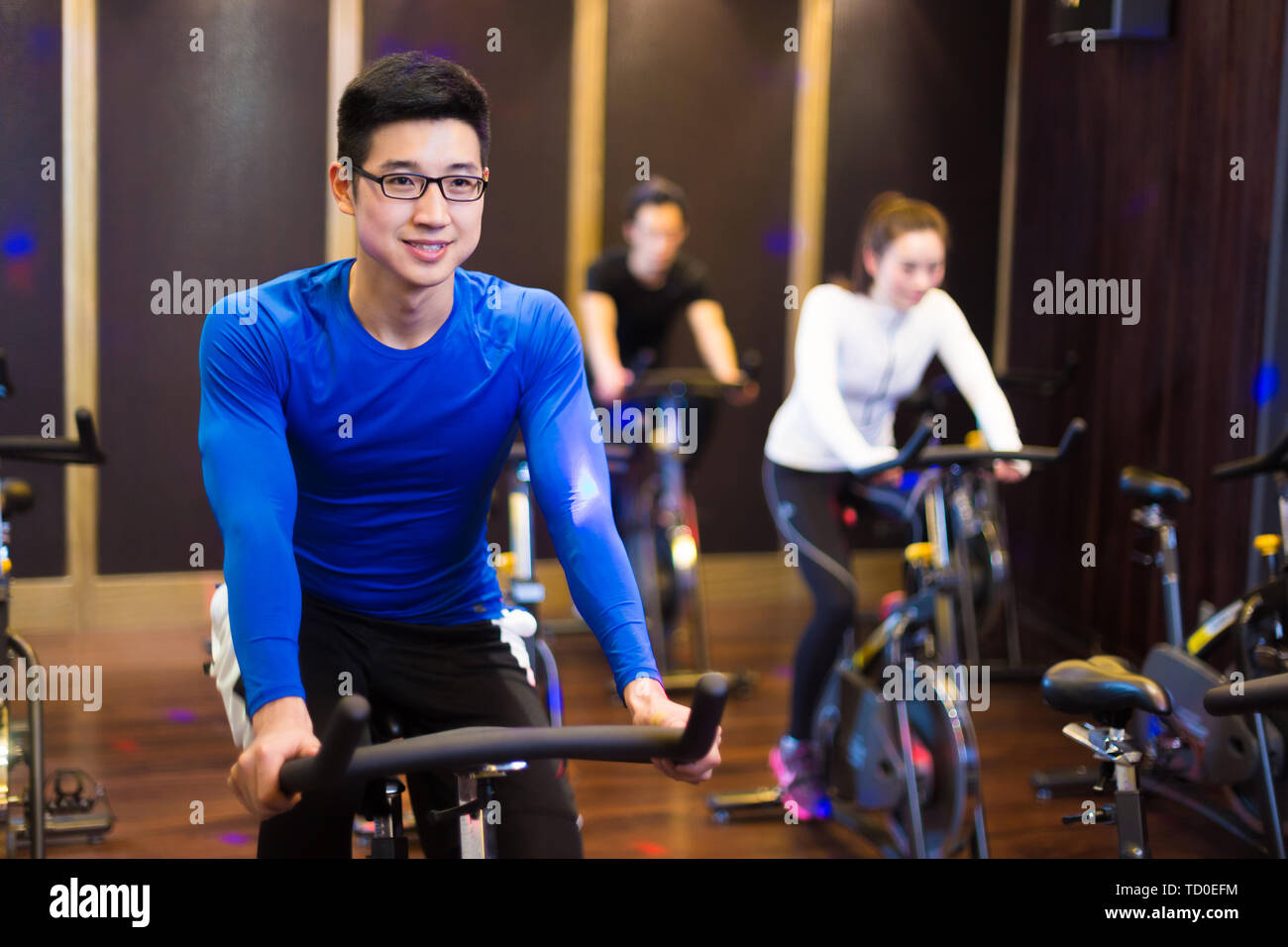 young asian people working out in modern gym Stock Photo - Alamy