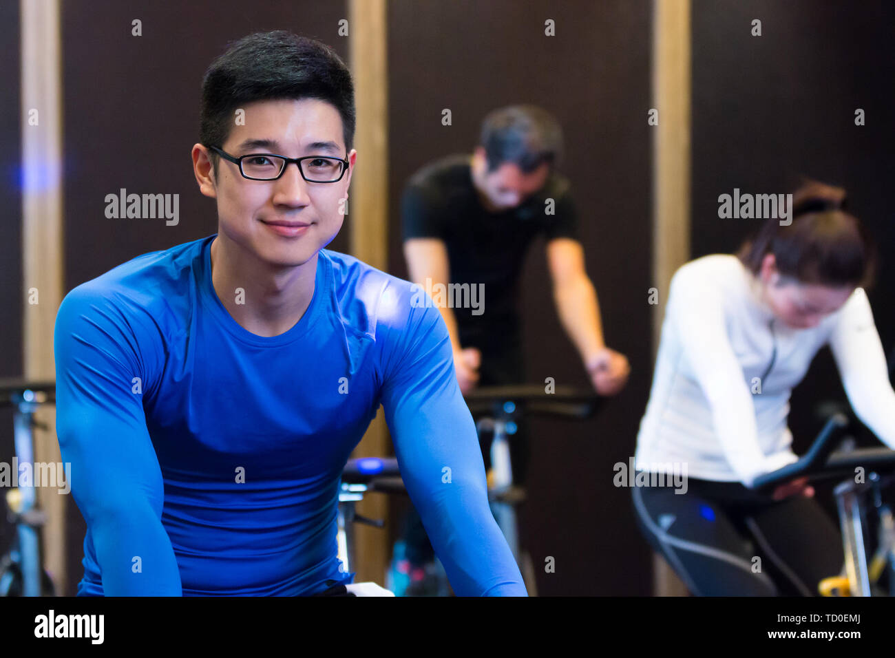 young asian people working out in modern gym Stock Photo - Alamy