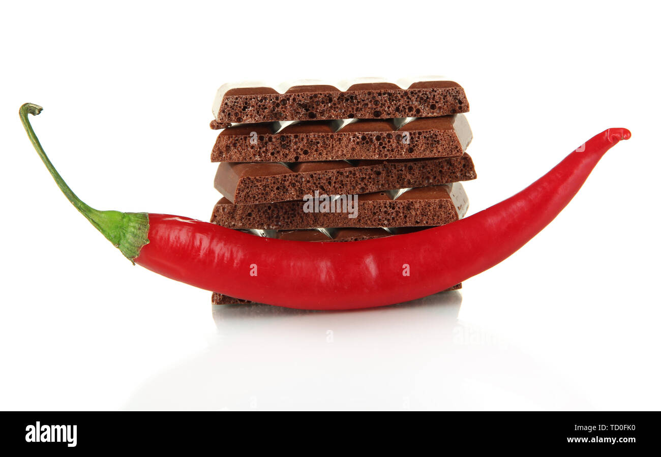 Dark chocolate with chili pepper, isolated on white Stock Photo - Alamy