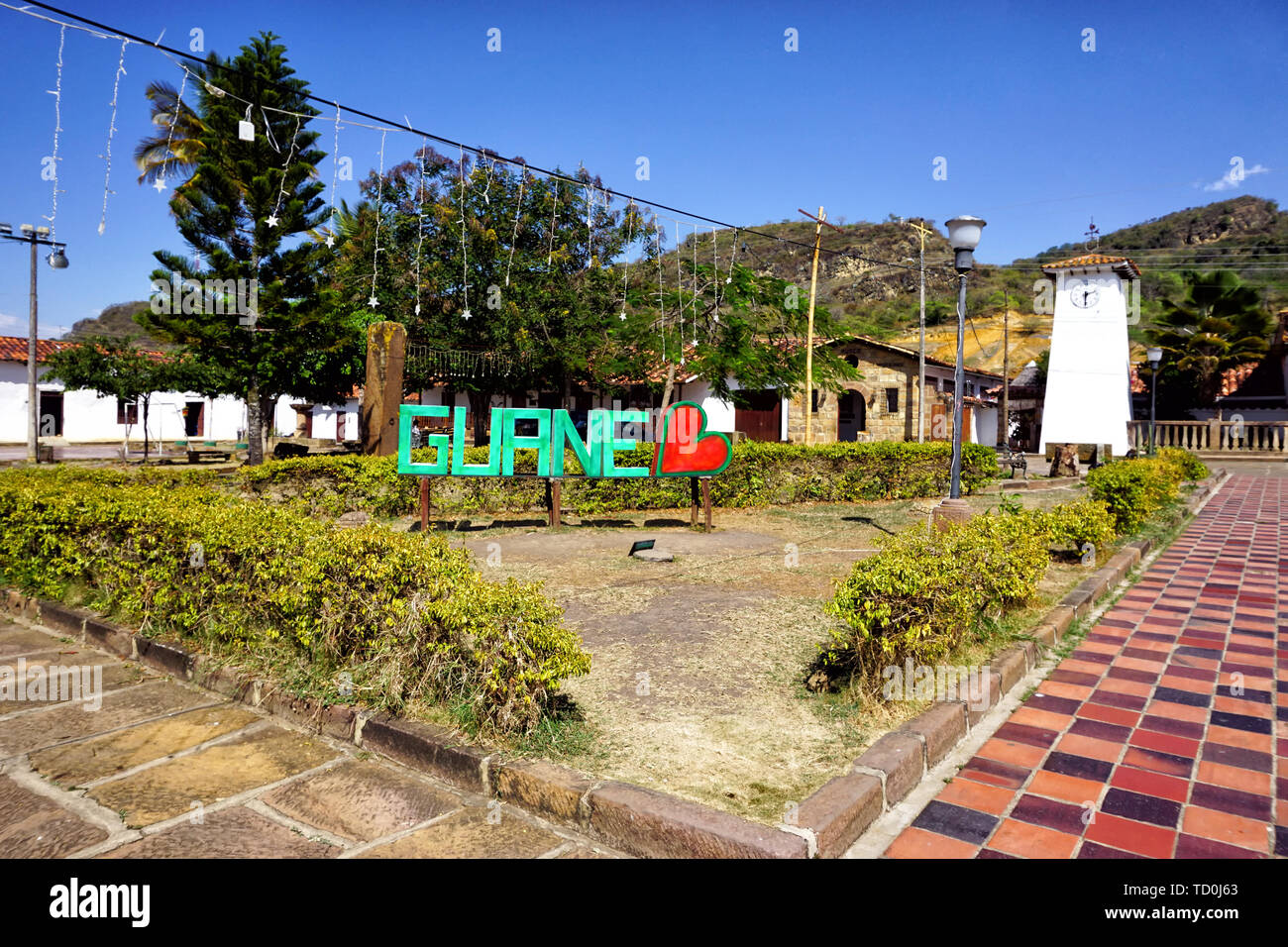 Panorama of the main square and tower clock in Guane, Colombia Stock ...