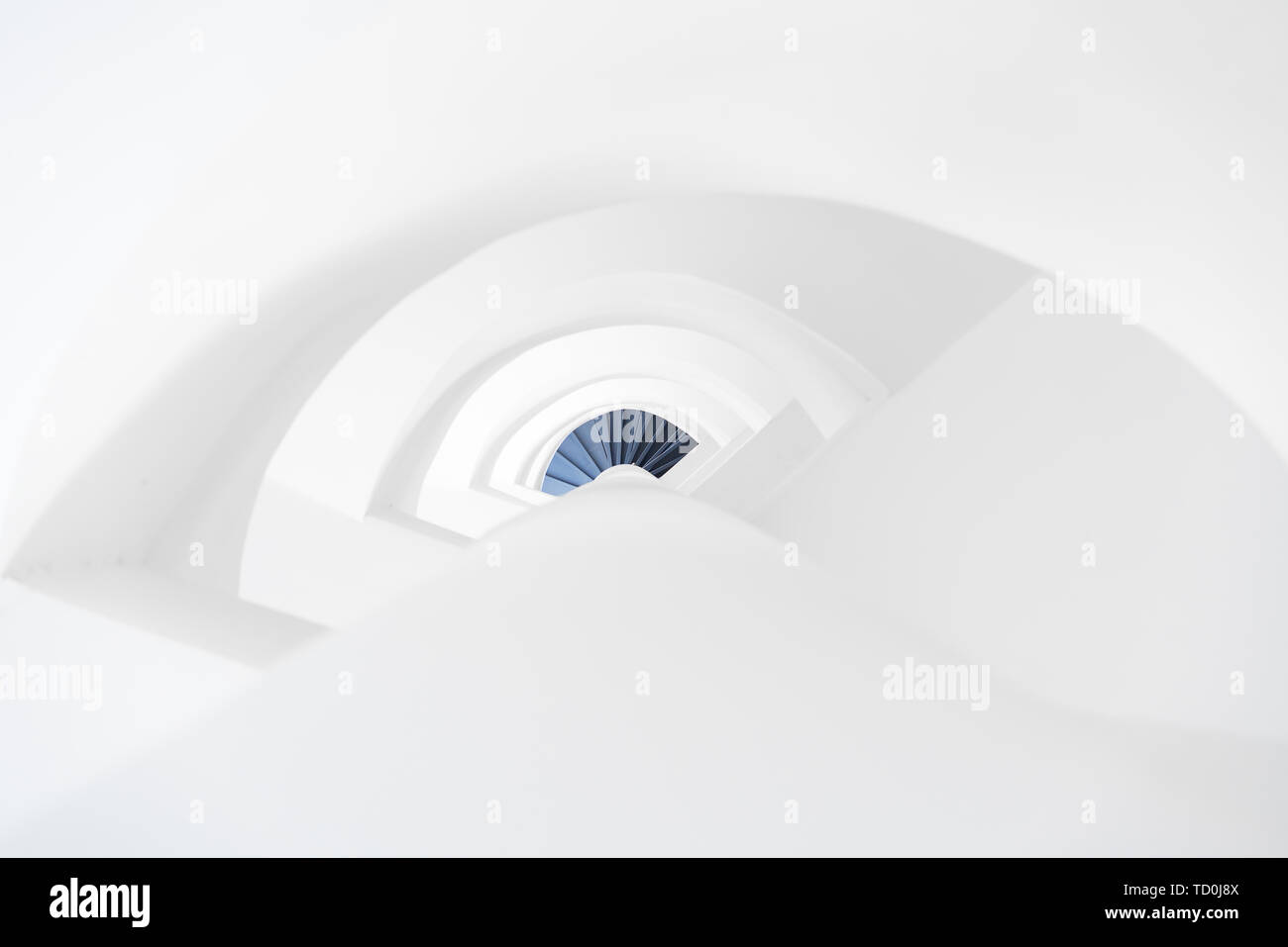 Rotating staircase minimalist white Stock Photo - Alamy