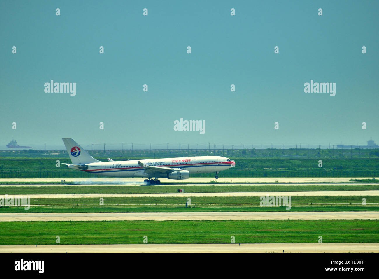 Airlines taking off from the airport Stock Photo - Alamy