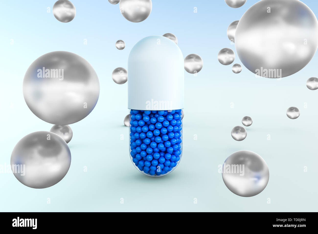 Blue granular capsule, 3-D rendering Stock Photo - Alamy