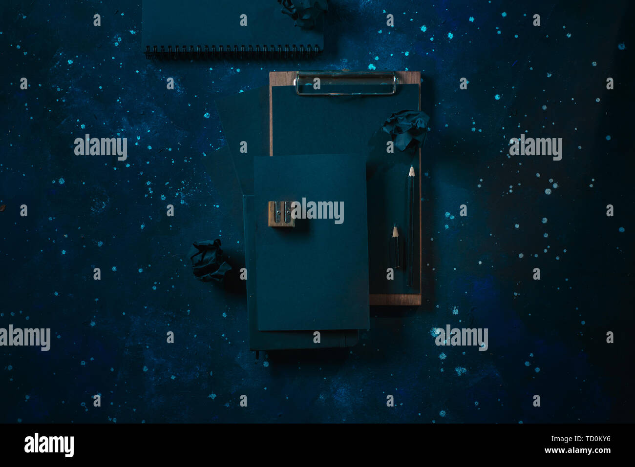 Science and research concept with a clipboard, black paper notes and a ...