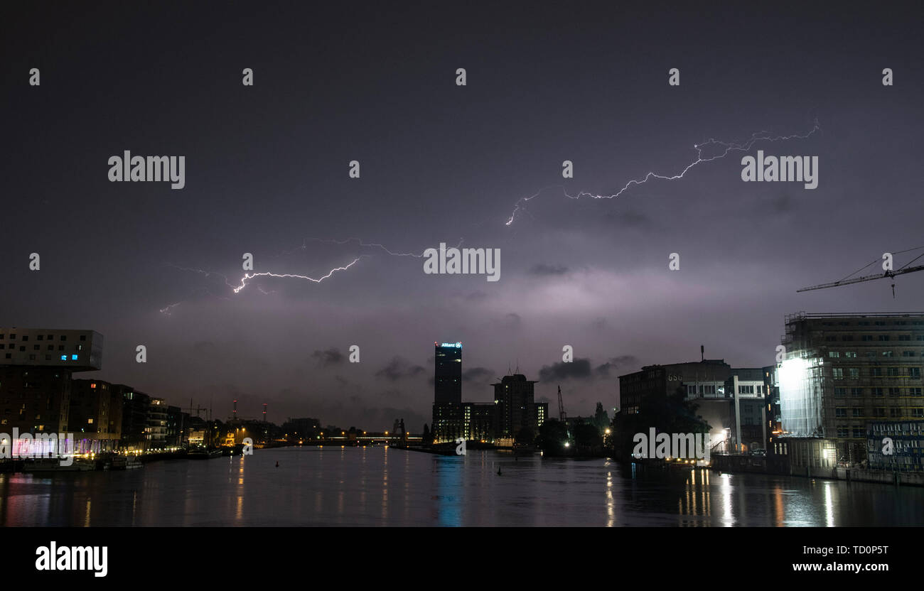 Berlin, Germany. 11th June, 2019. Lightning flashes across the sky ...