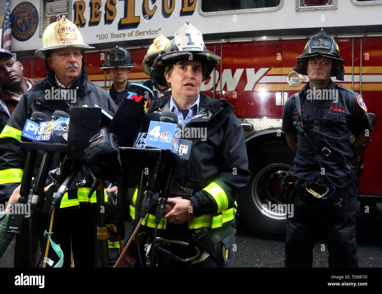 New York City, New York, USA. 10th June, 2019. (L) Fire department ...