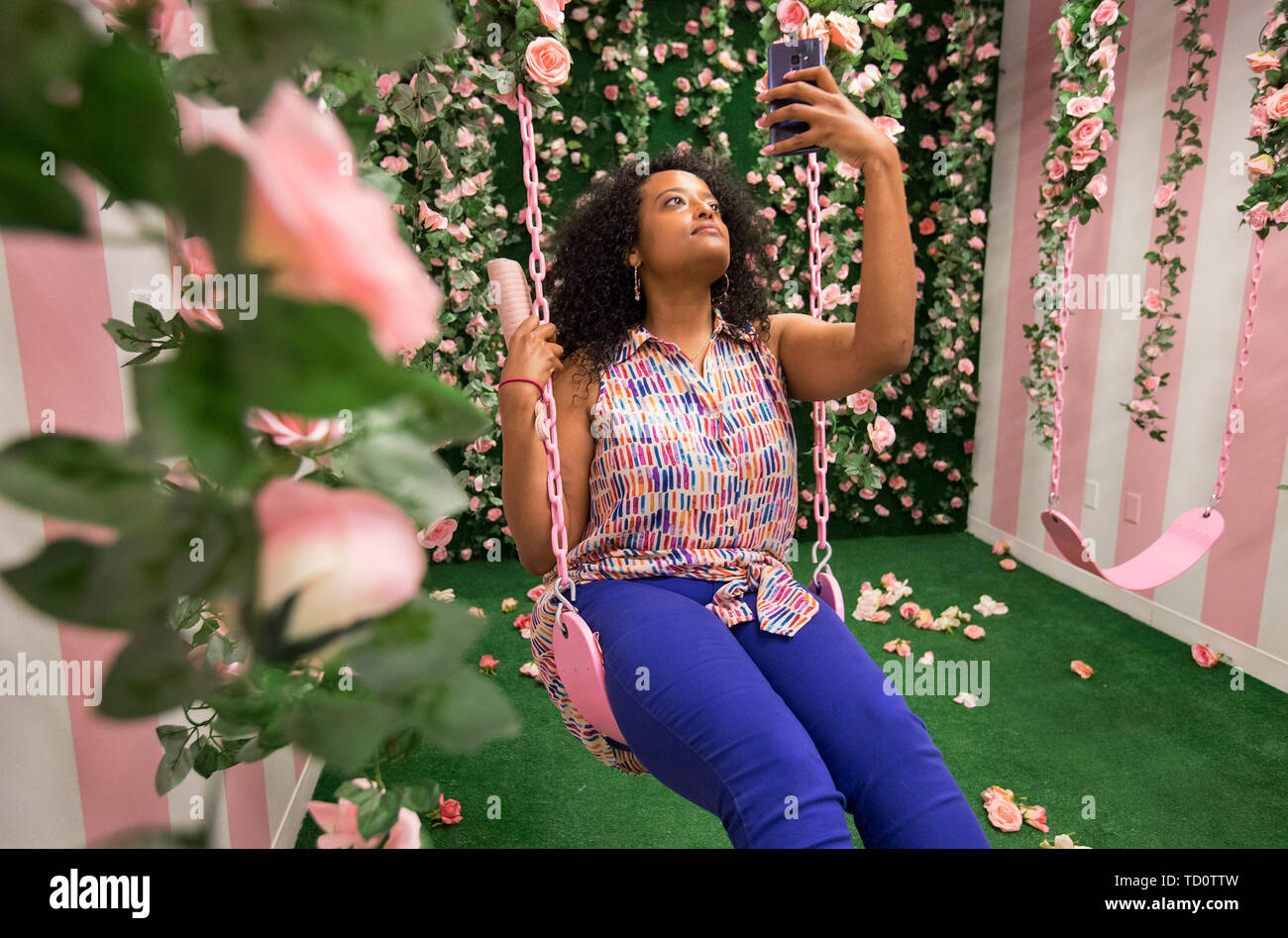 Houston, USA. 10th June, 2019. A woman takes photos from the FOMO ...