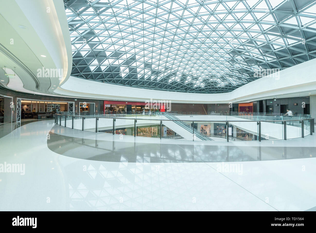 Automatic staircase in indoor shopping mall with ceiling hi-res stock ...