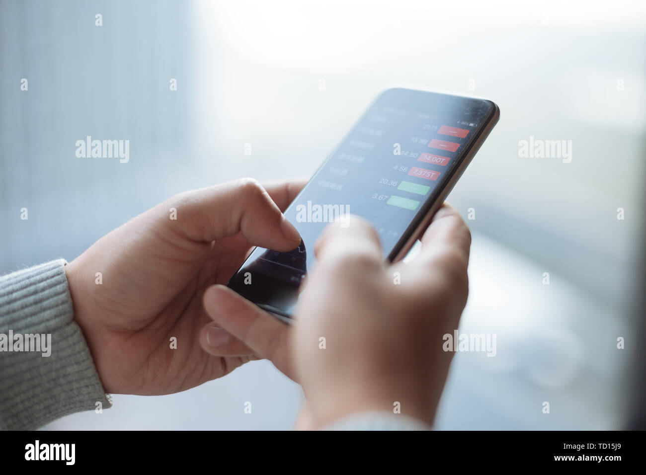 Mobile phone in man's hand Stock Photo - Alamy