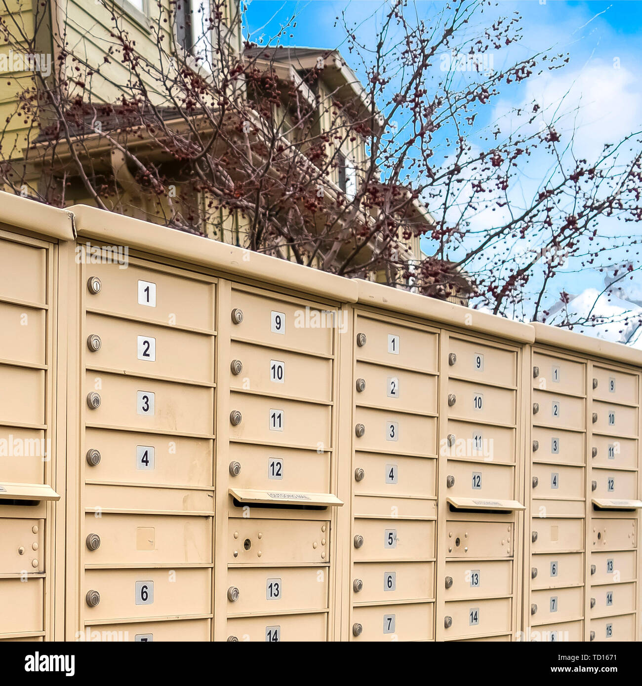 Square frame Residential mailboxes with numbered compartments on the ...