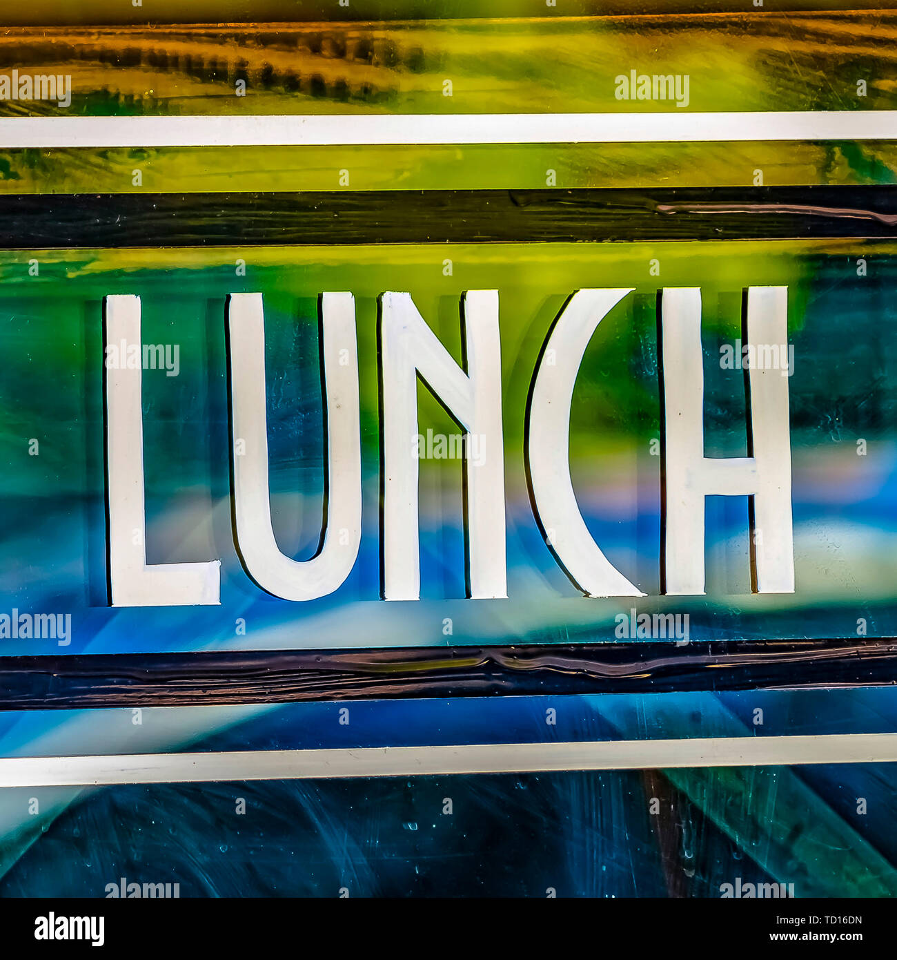 Square Close up view of a Lunch sign against the glass wall of a ...