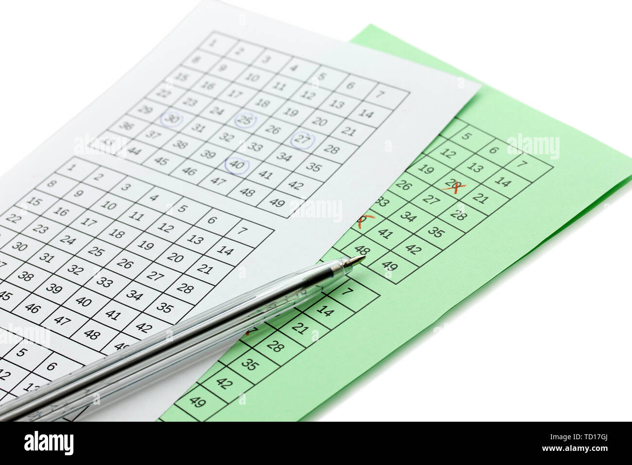 Lottery tickets and pen, isolated on white Stock Photo - Alamy