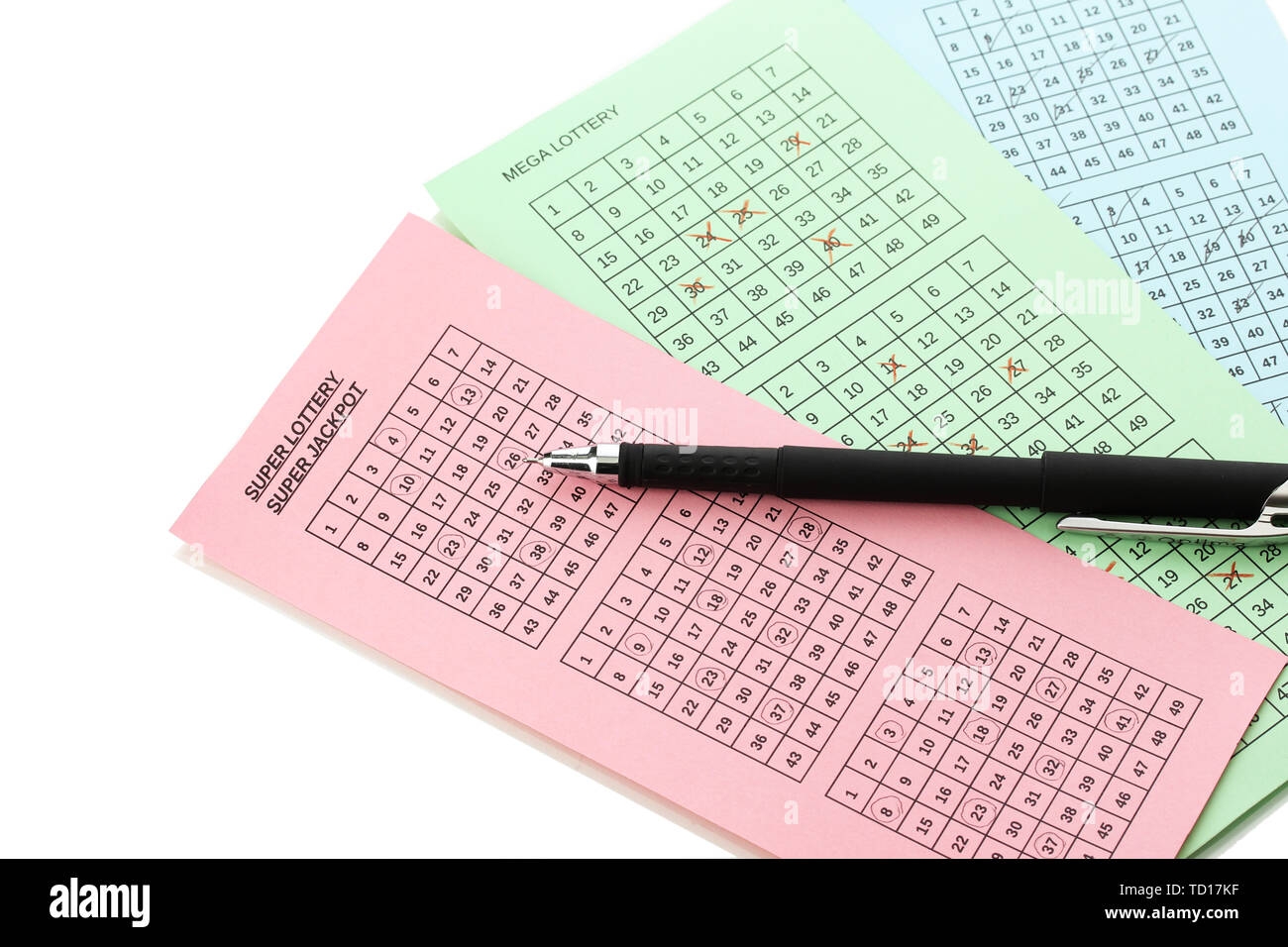 Lottery tickets and pen, isolated on white Stock Photo - Alamy