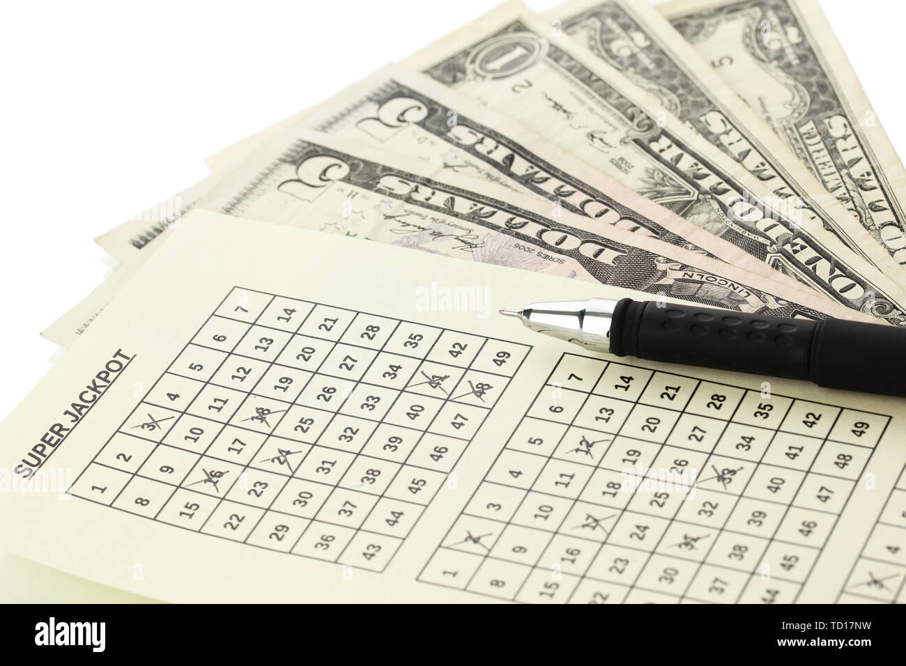 Lottery ticket with pen and money, isolated on white Stock Photo - Alamy