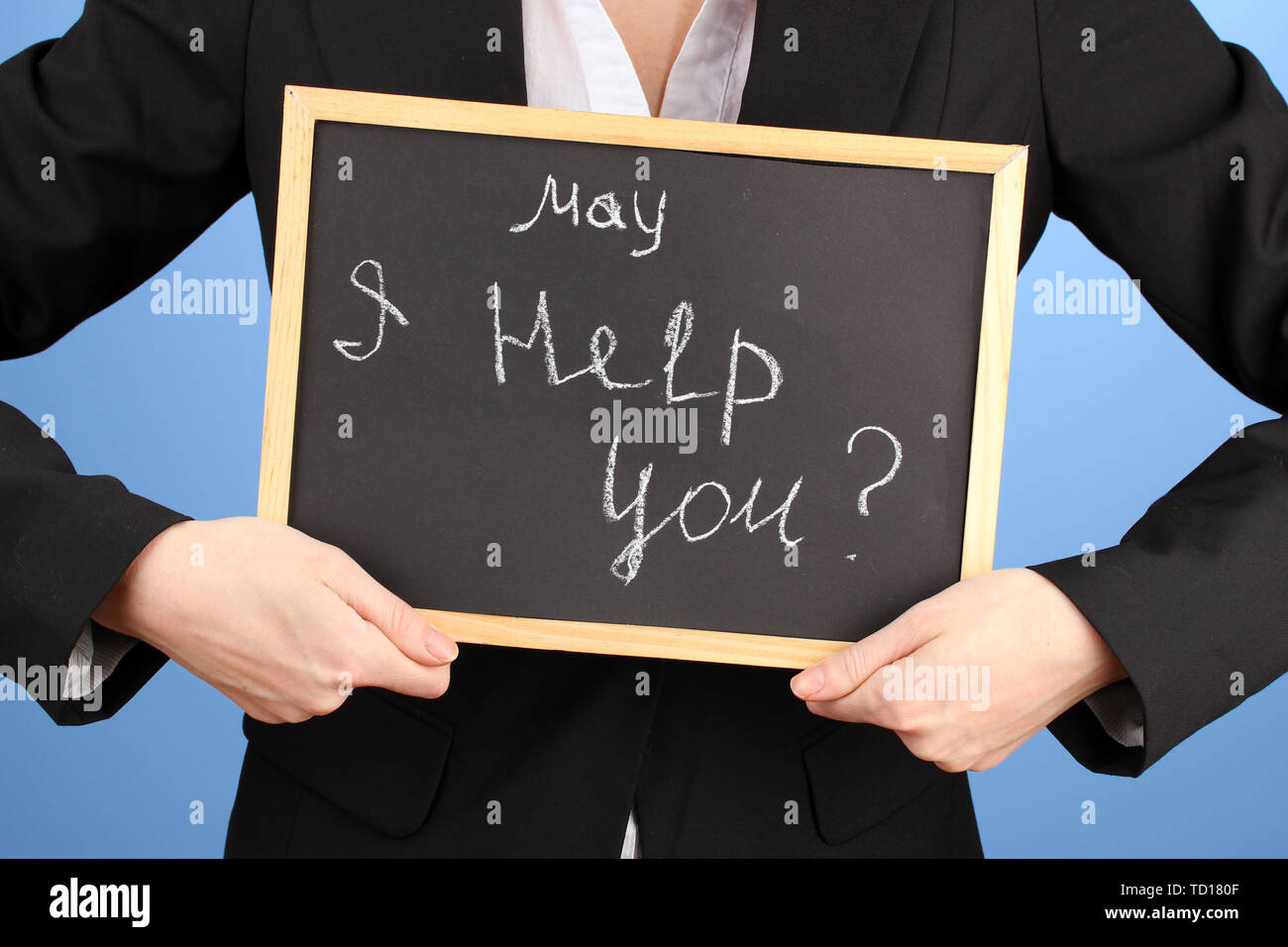 Young woman holding sign May Stock Photo - Alamy