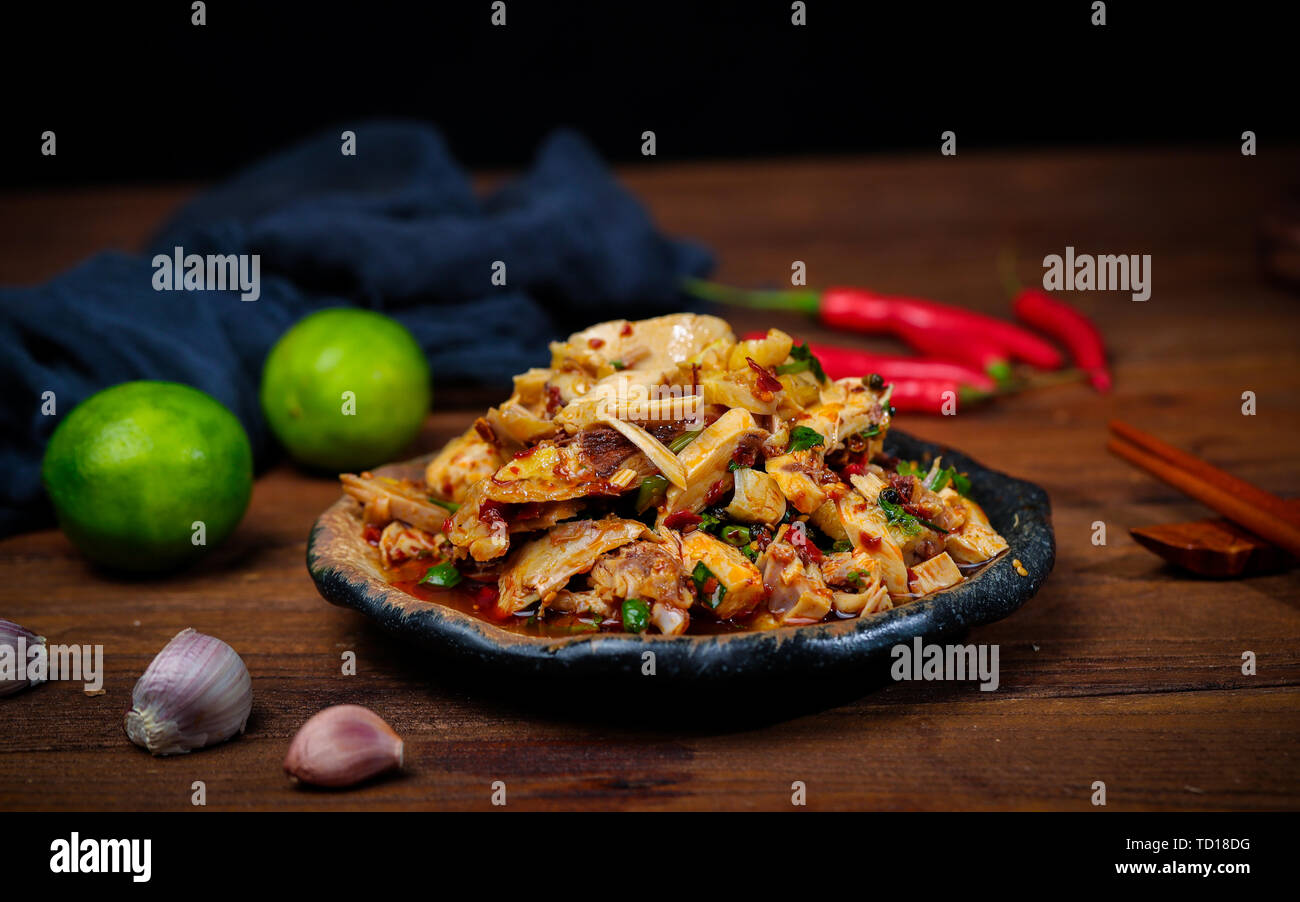 drooling chicken, stick chicken Stock Photo - Alamy