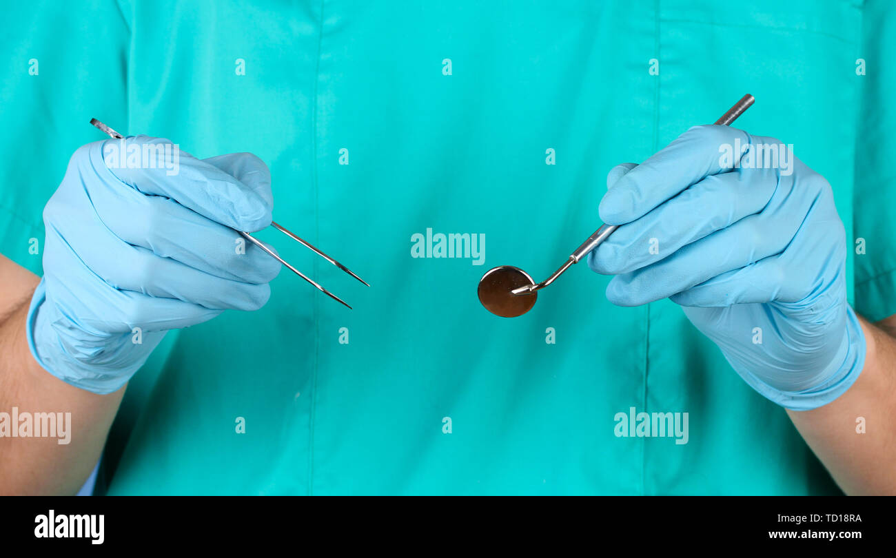 Dentist hand pick instruments hi-res stock photography and images - Alamy