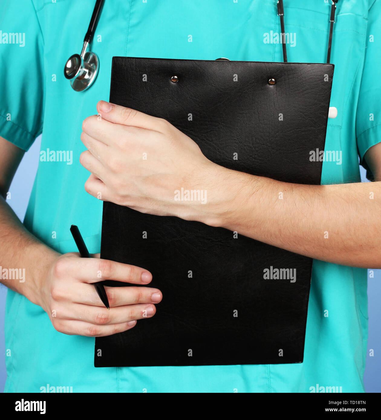 Hand of doctor with prescription blank, on blue background Stock Photo ...