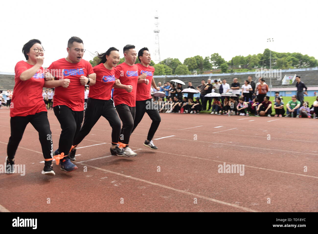 The five-person three-legged competition at the Staff Games held in ...