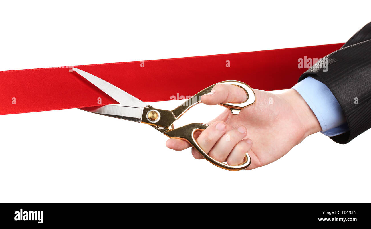 Cutting red ribbon, isolated on white Stock Photo - Alamy
